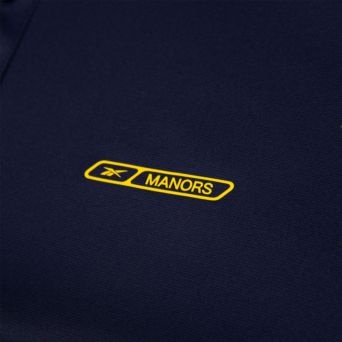 Manors x Reebok Performance Polo Atlantic Blue | TRENDYGOLF UK